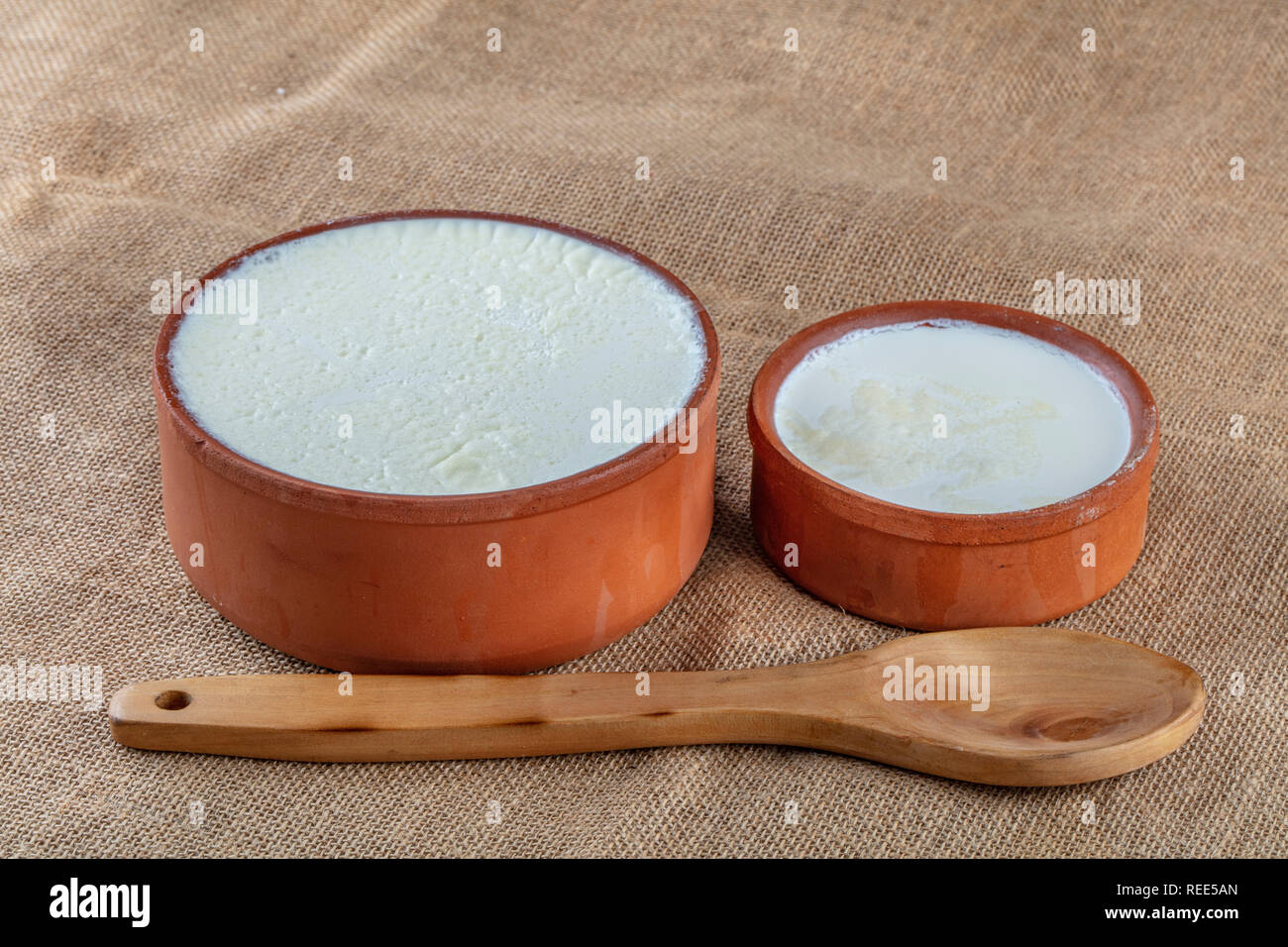 Turkish and Greek traditional dairy food yogurt or yoghurt in a pot ...