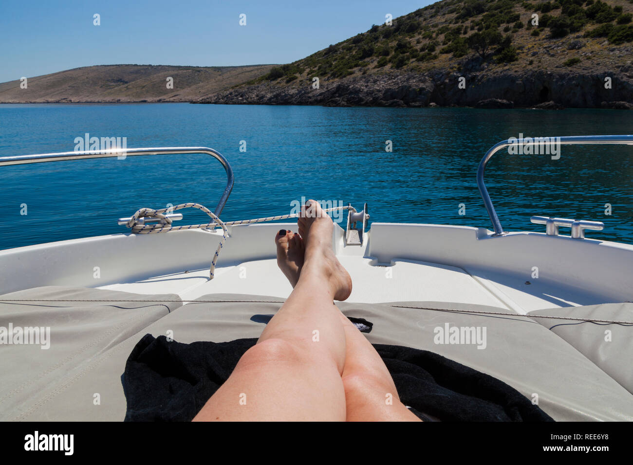 Woman sunbathing legs hi-res stock photography and images - Alamy