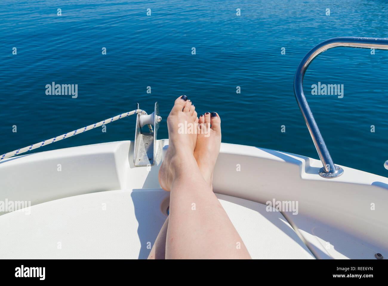 Young woman relaxing on sailboat hi-res stock photography and images ...
