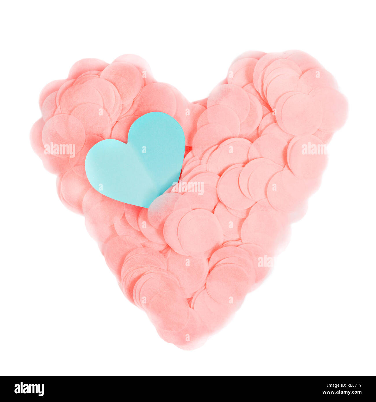 Heart shape made of paper confetti with blue heart of paper cut ...