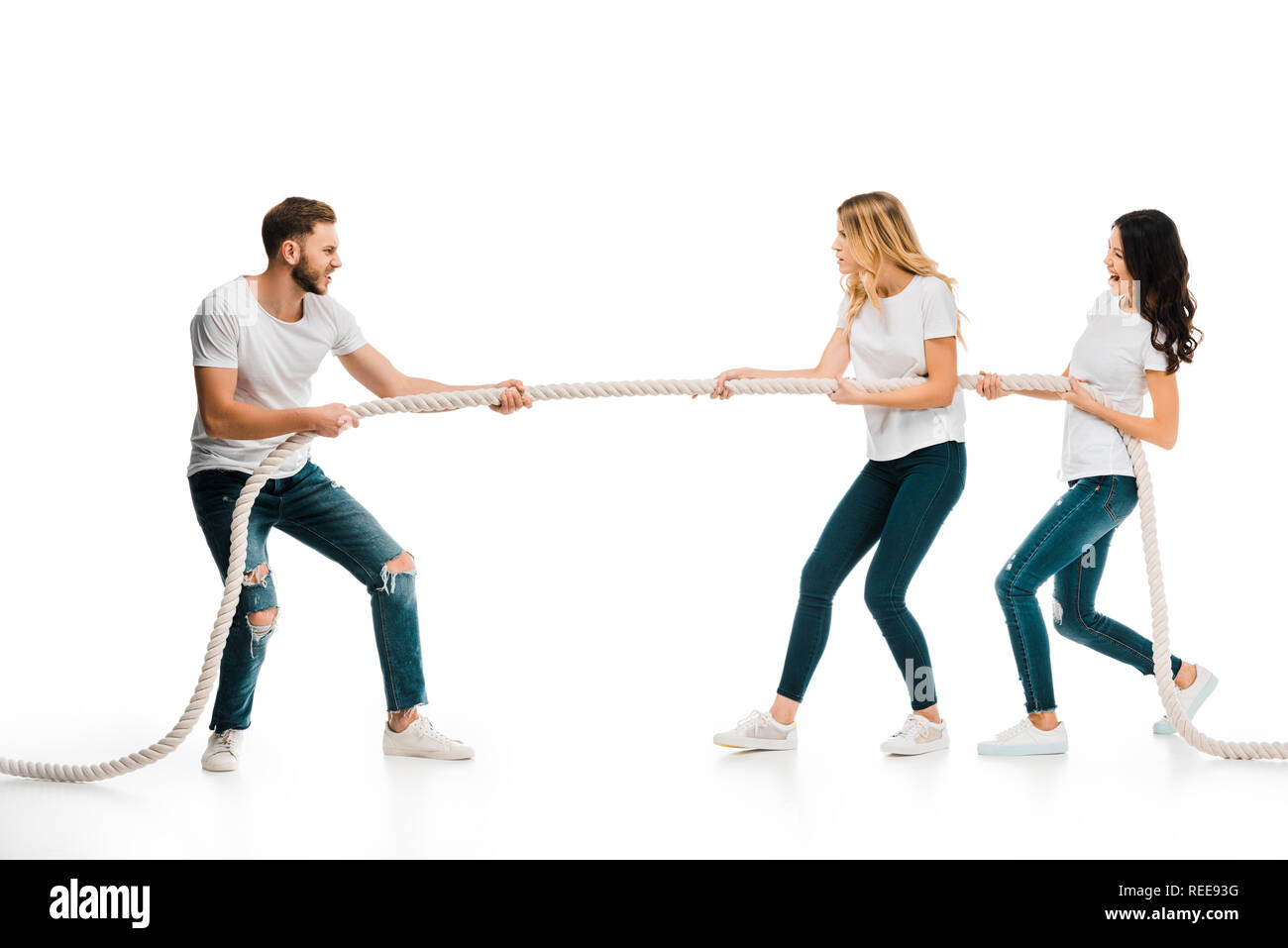 emotional young man and women pulling rope isolated on white Stock ...