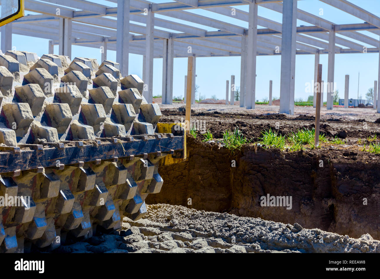 Pattern tracks of huge road roller with spikes, compacting soil for a ...