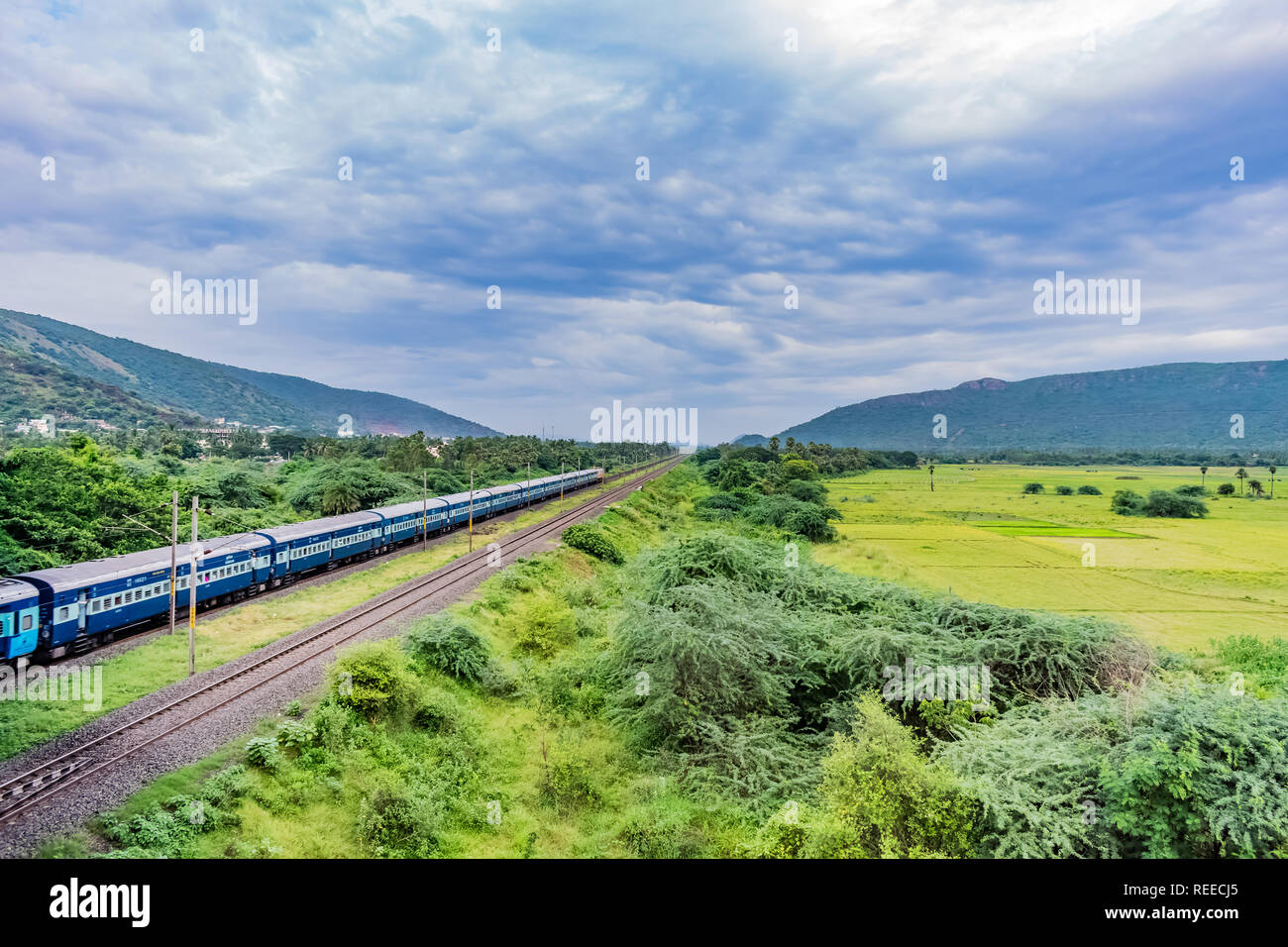 awesome view of Indian railway running on track goes to horizon in ...