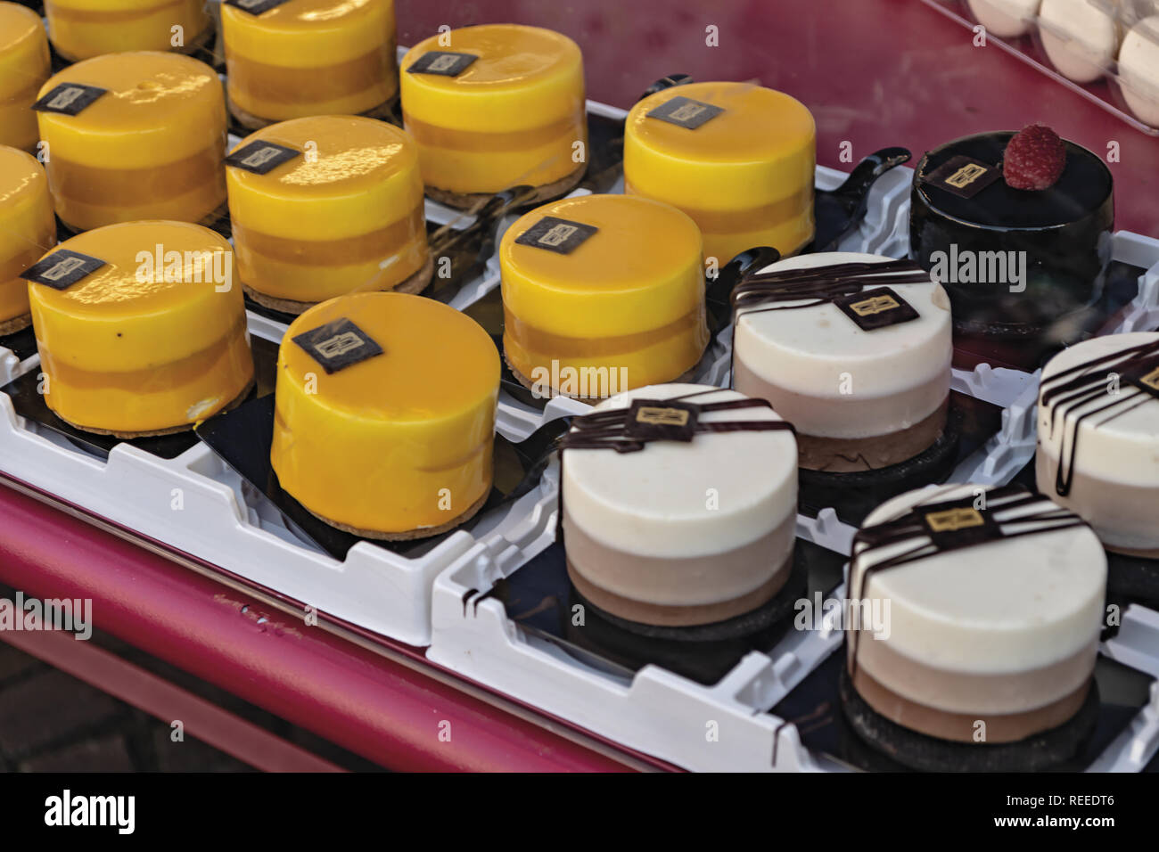 chocolate yellow and white pastries Stock Photo - Alamy