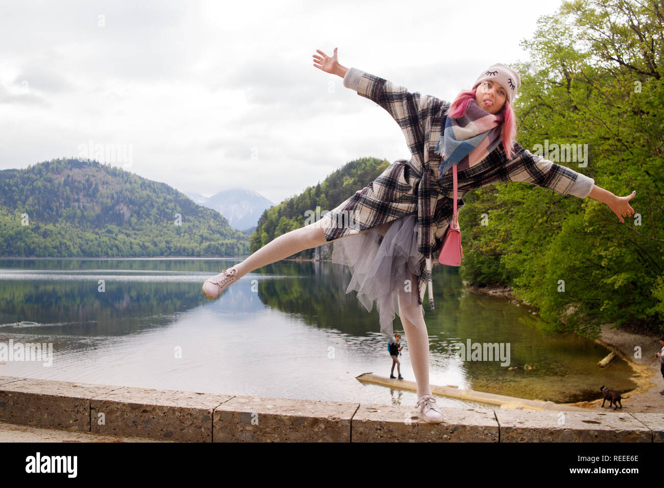 girl near the lake Neuschwanstein castle Stock Photo - Alamy