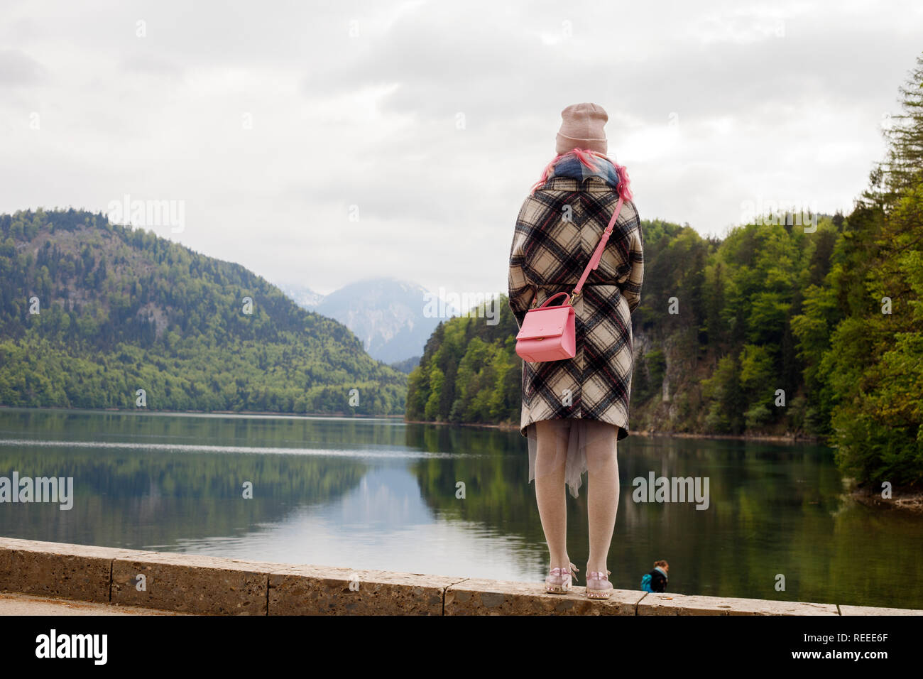girl near the lake Neuschwanstein castle Stock Photo - Alamy