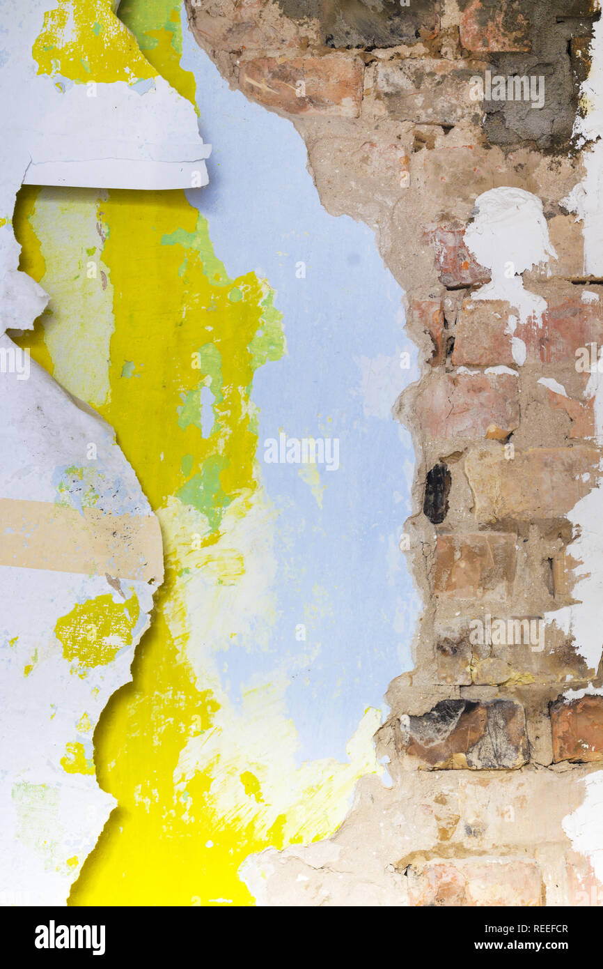 Repair old wall. Broken plaster and wallpaper background. Apartment ...