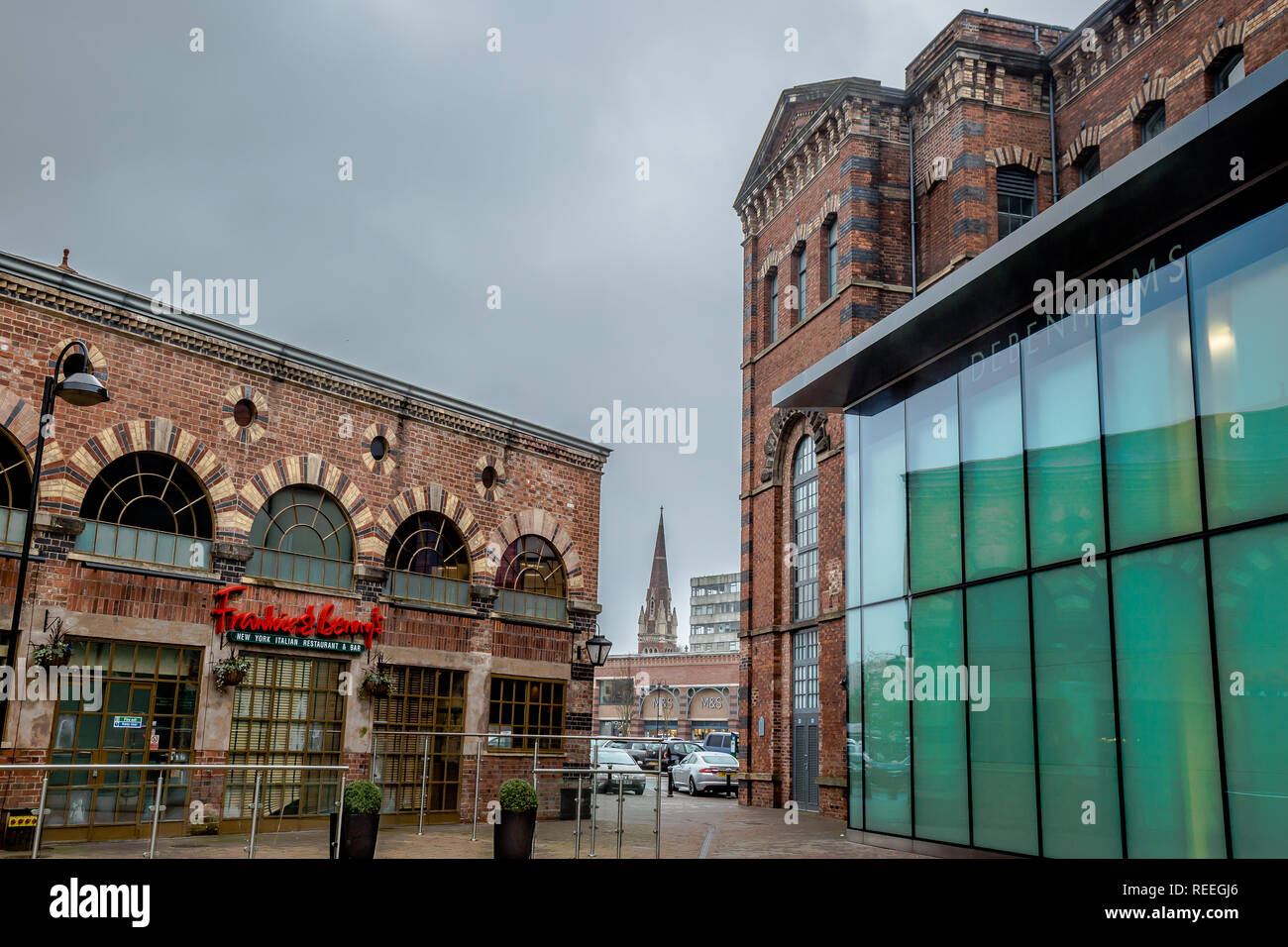 Landscape shot of town redevelopment. Grade II listed historic carpet ...