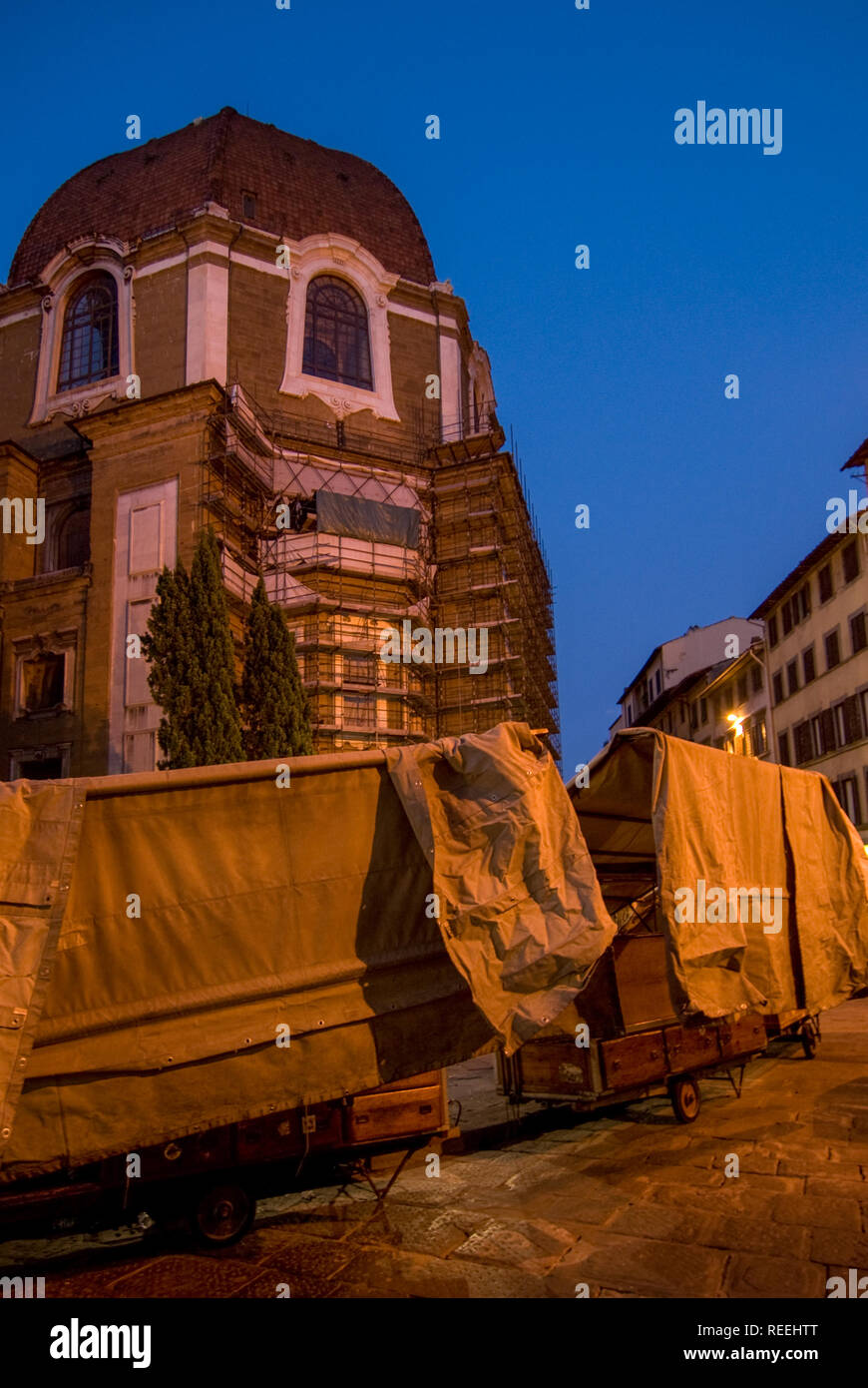 preparing the upcoming market day with old looking mobile booths in ...