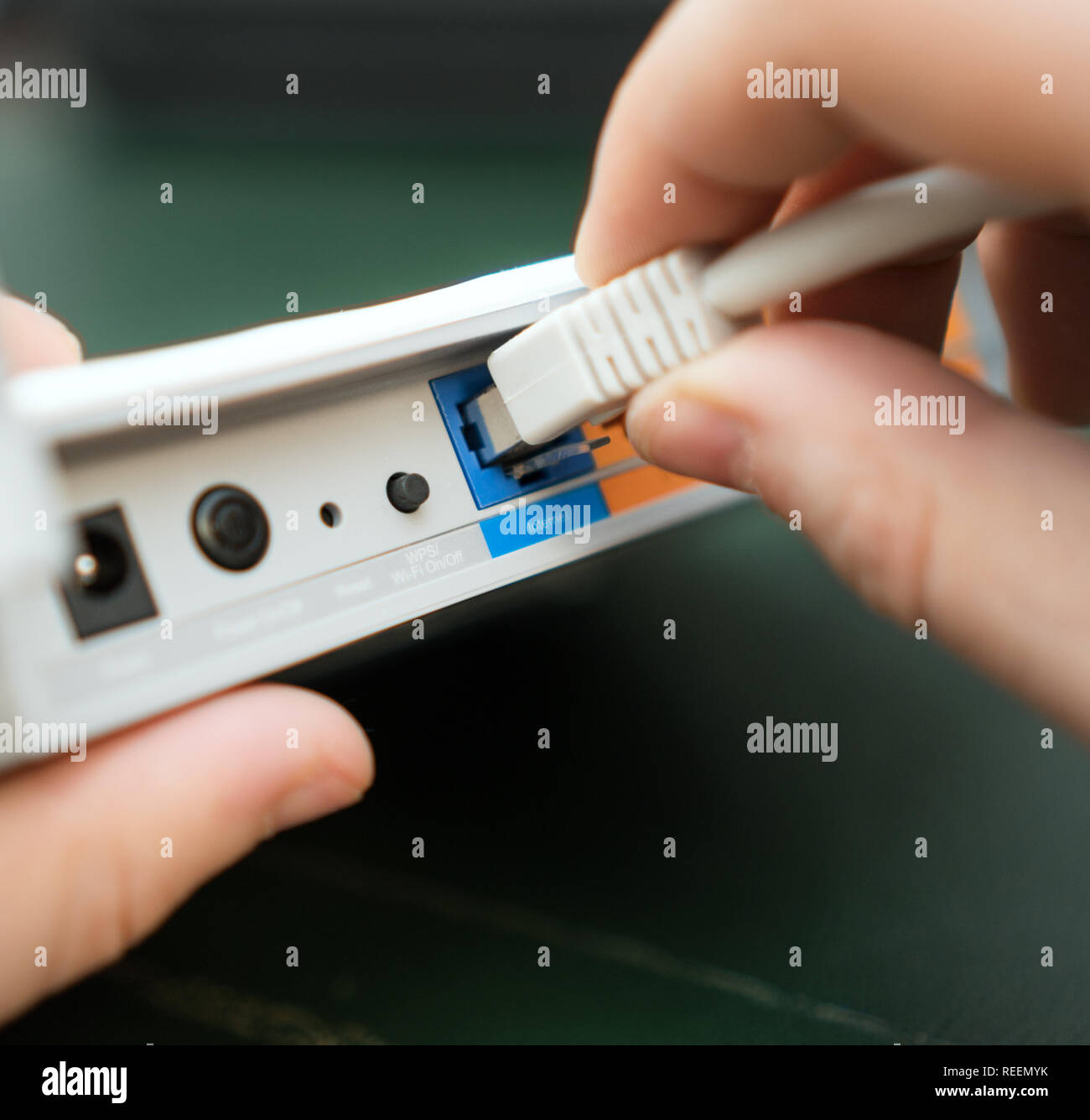 Plugging lan cable port hand hi-res stock photography and images - Alamy