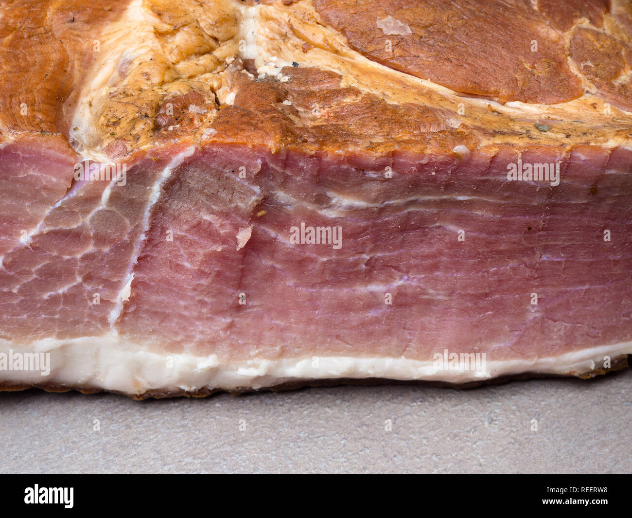 Piece of ham isolated on grey background. Meatworks product Stock Photo ...