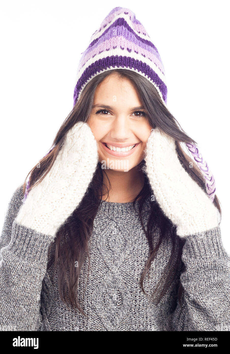 Pretty Brunette Woman With A Woolen Peruvian Hat A Sweater And Gloves