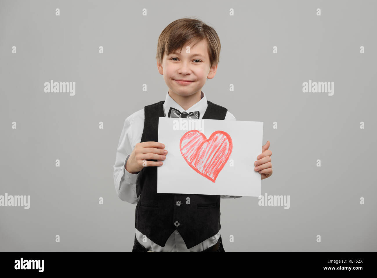 School boy with painted heart Stock Photo - Alamy