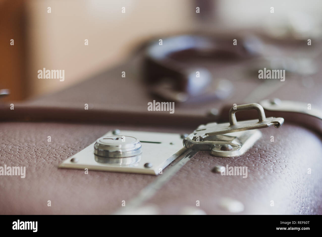 Latch and lock of vintage cardboard brown suitcase with handle Stock ...