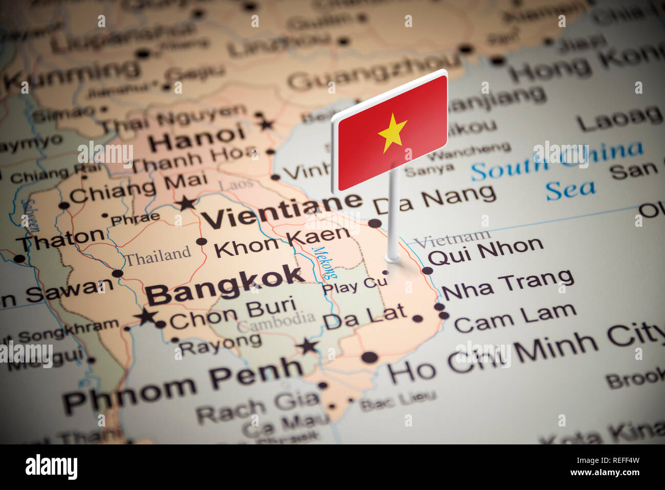 Vietnam marked with a flag on the map Stock Photo - Alamy