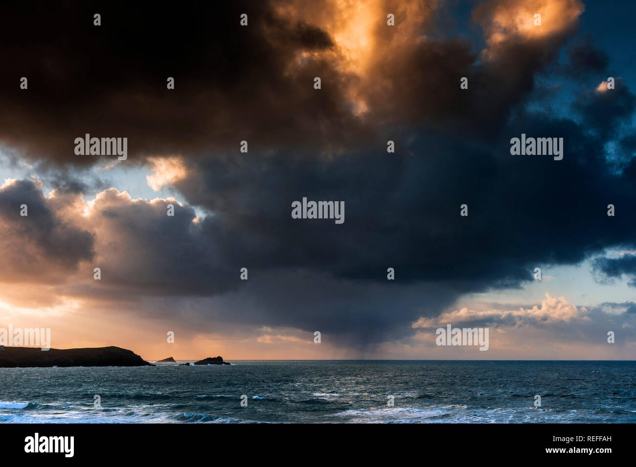 A dramatic fiery sky at sunset over Fistral in Newquay Cornwall Stock ...