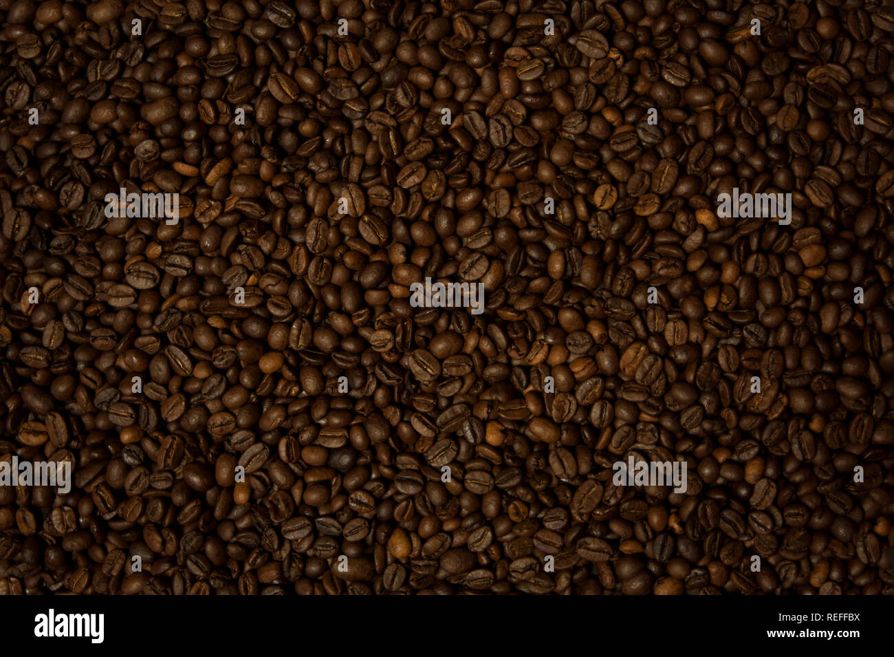Coffee beans background top view. Close Up Stock Photo - Alamy