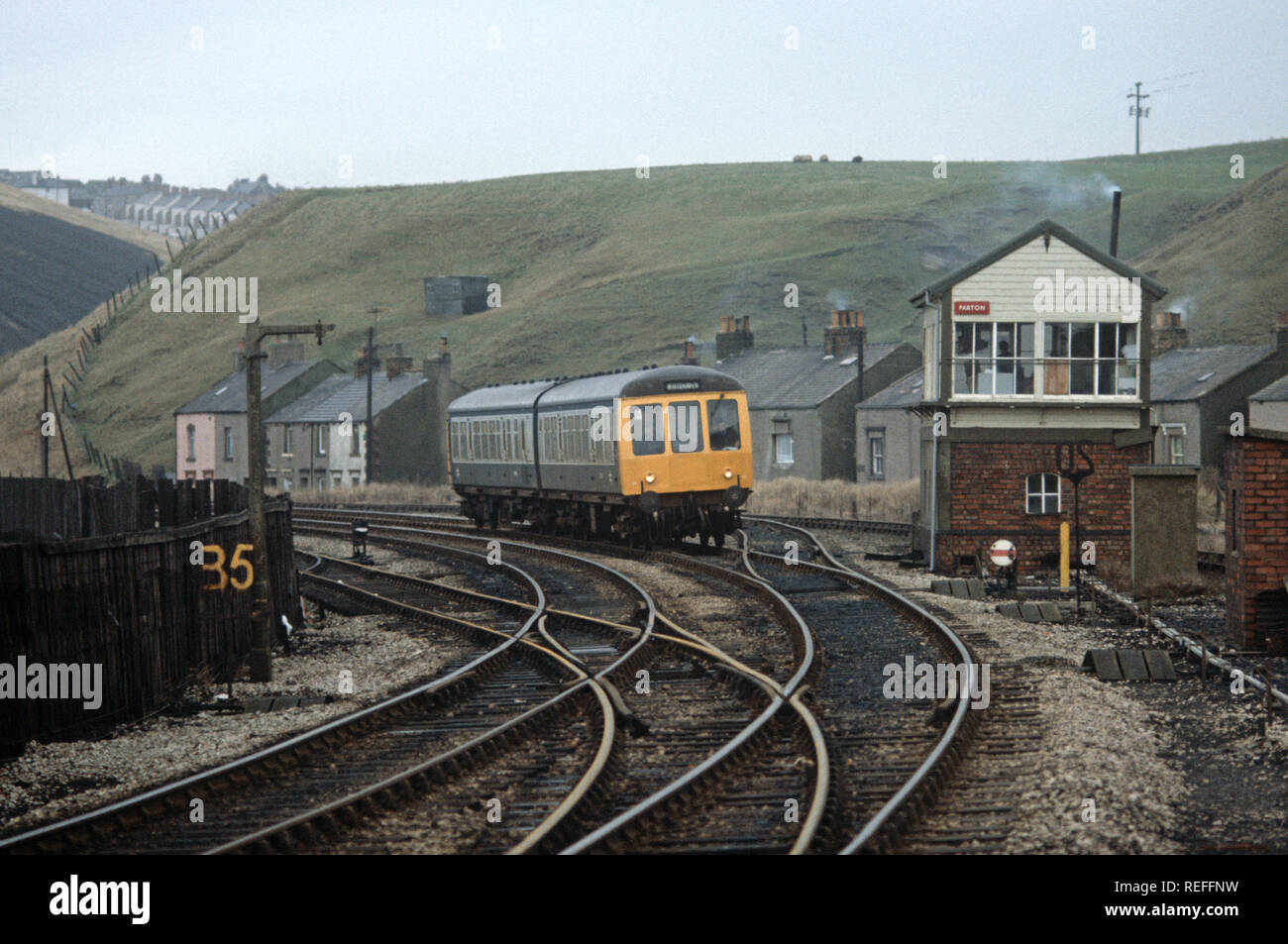 Diesel Multiple Unit train at Parton signal box and railway junction on ...