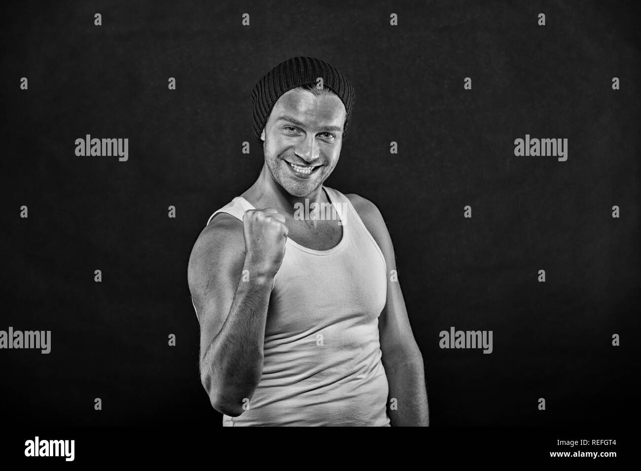 Victory and achievement. Happy man with winner gesture. Macho smile in ...