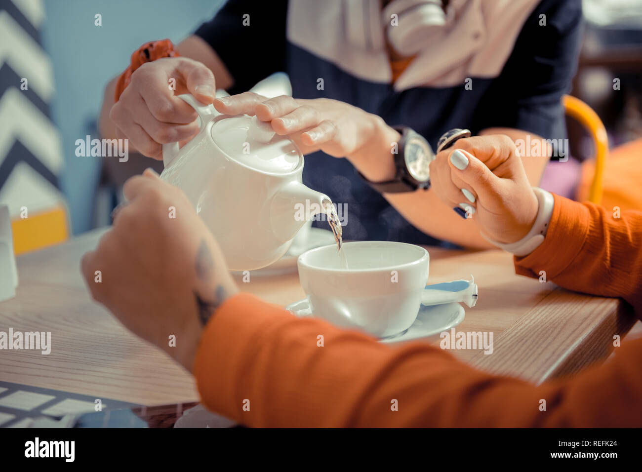 Man and a woman drinking morning tea together Stock Photo - Alamy