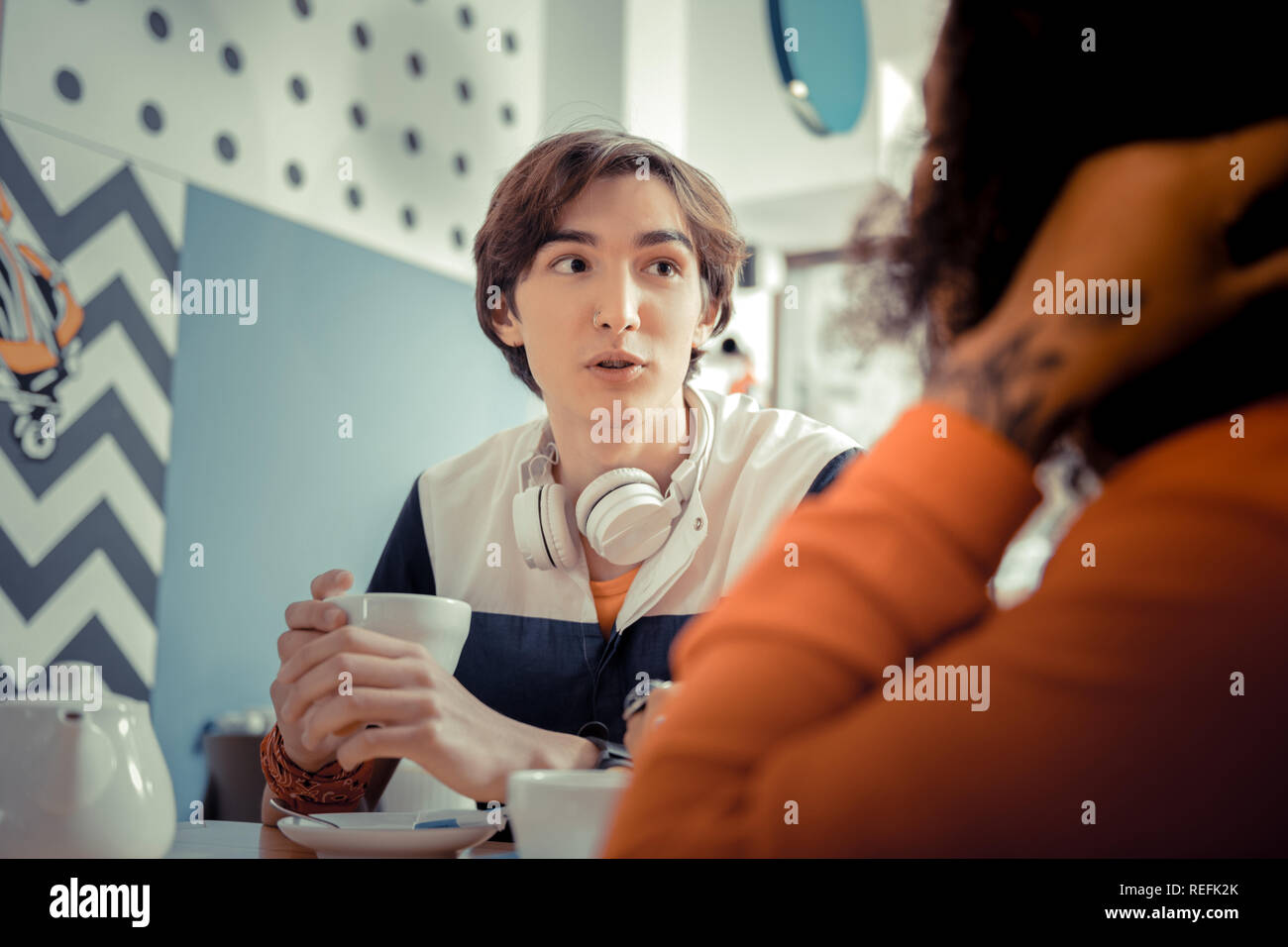 Teens drinking tasty tea during the date Stock Photo - Alamy