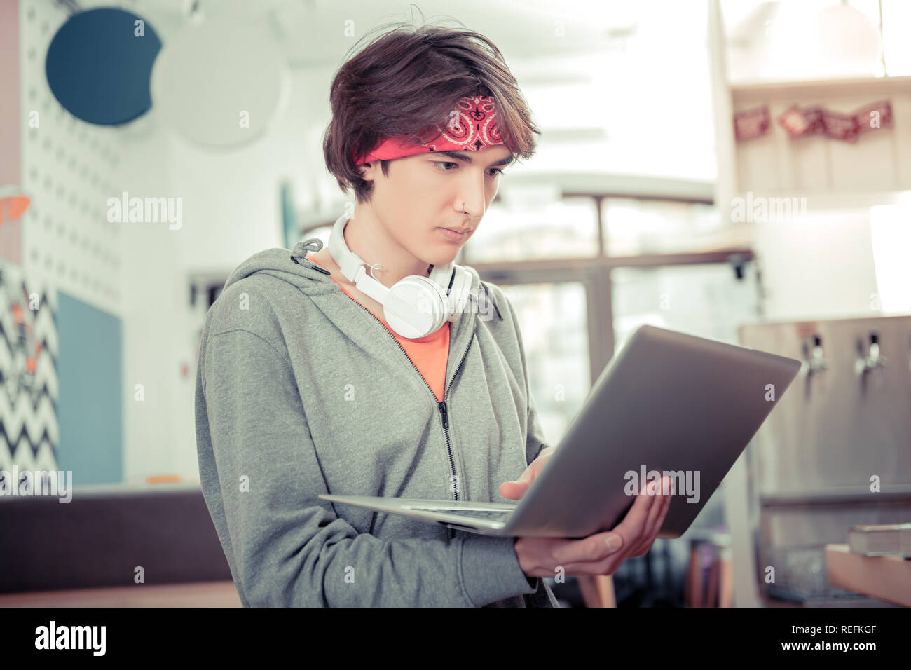 Motivated teen learning programming languages with online app Stock ...