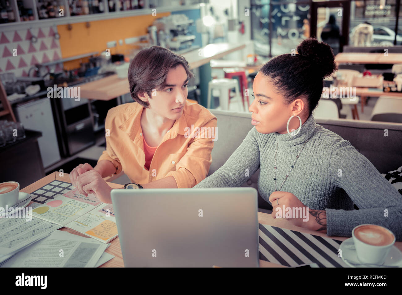 Students studying foreign languages together in the cafe Stock Photo ...