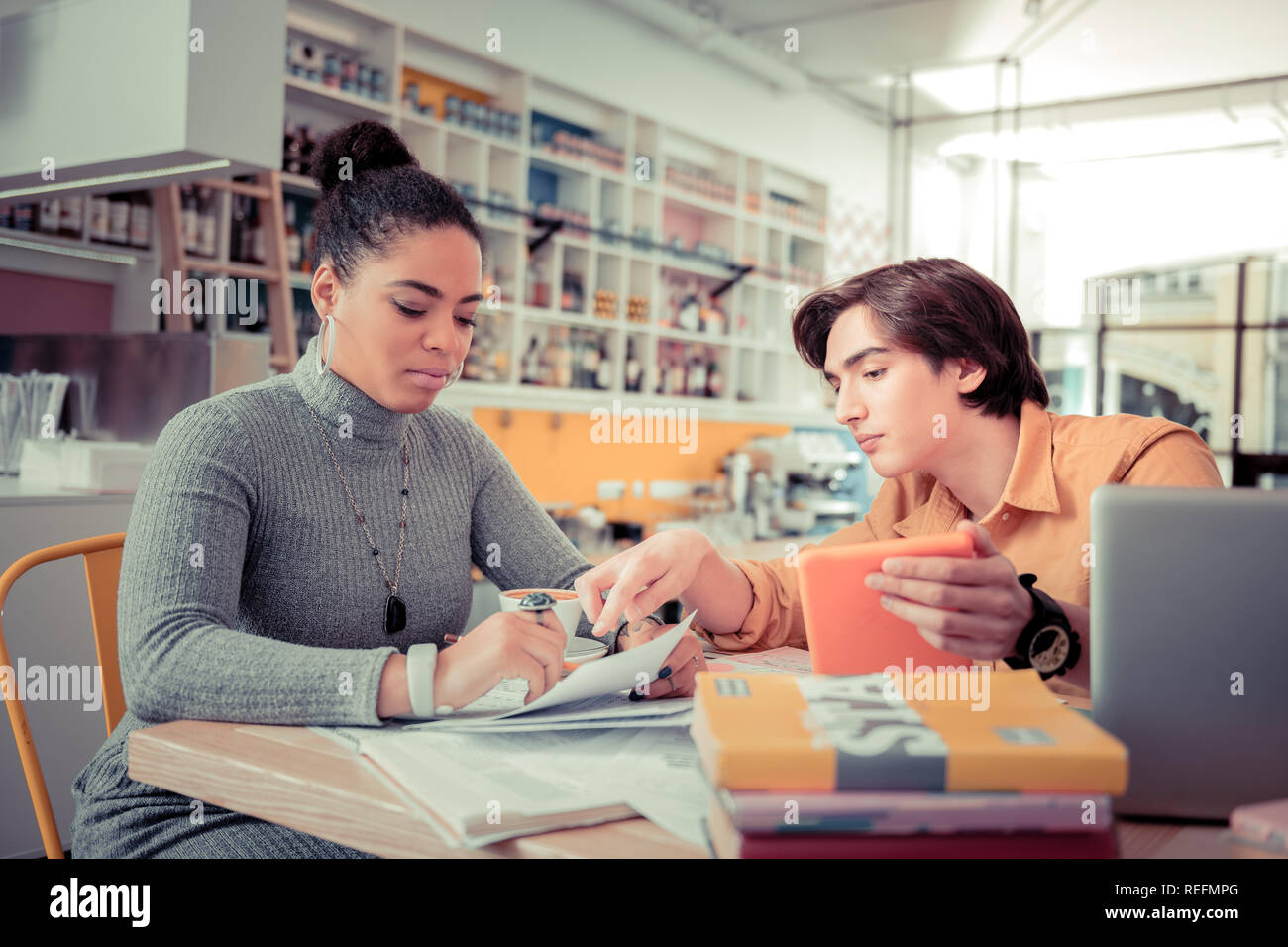 Students checking their test answers online using a tablet Stock Photo ...