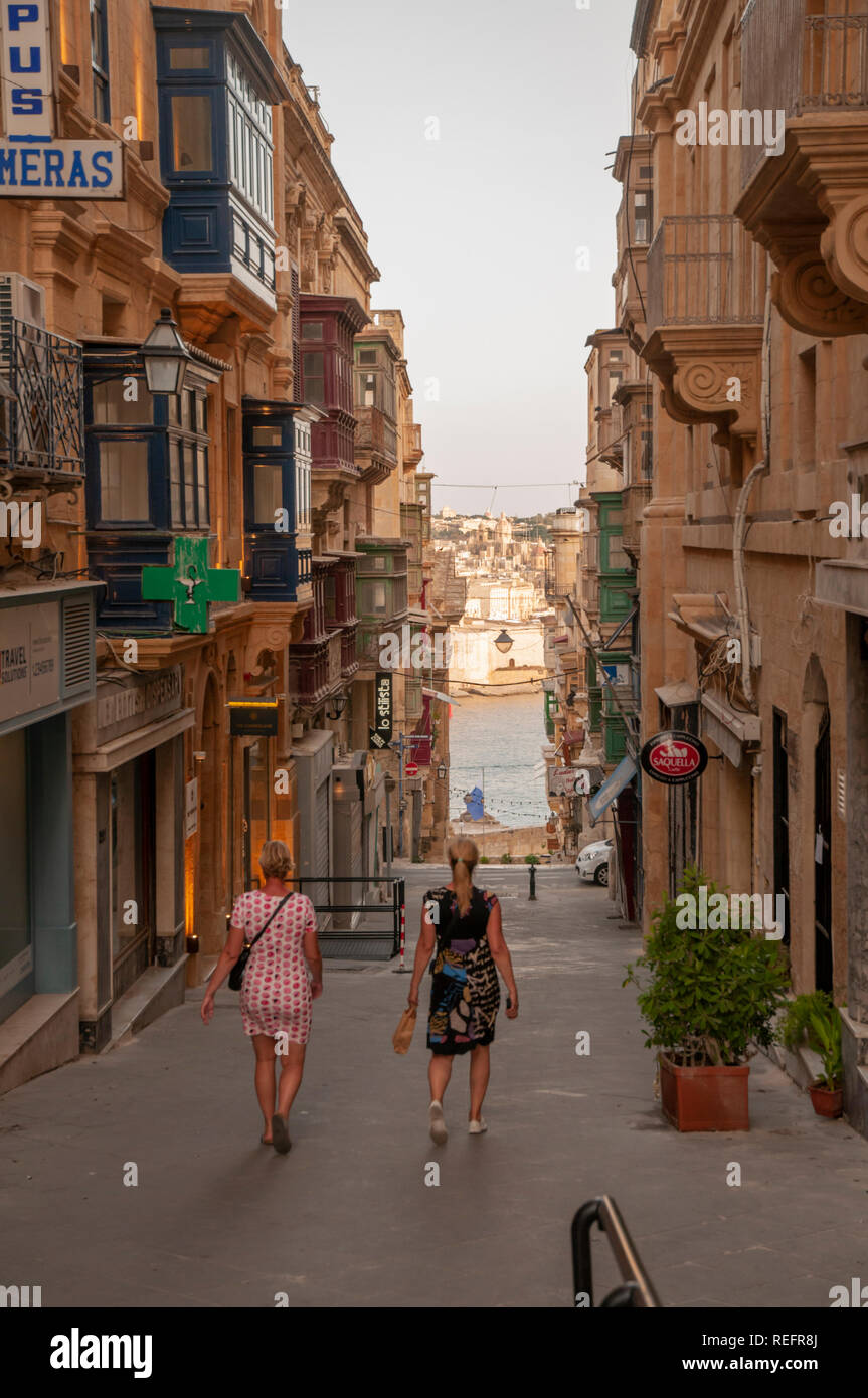A view down San Gwann Street (Triq San Gwann). It is a typical narrow ...