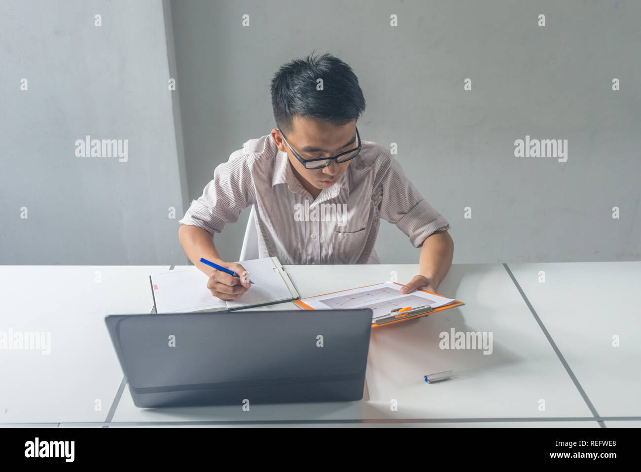 Asian businessman taking meeting hi-res stock photography and images ...