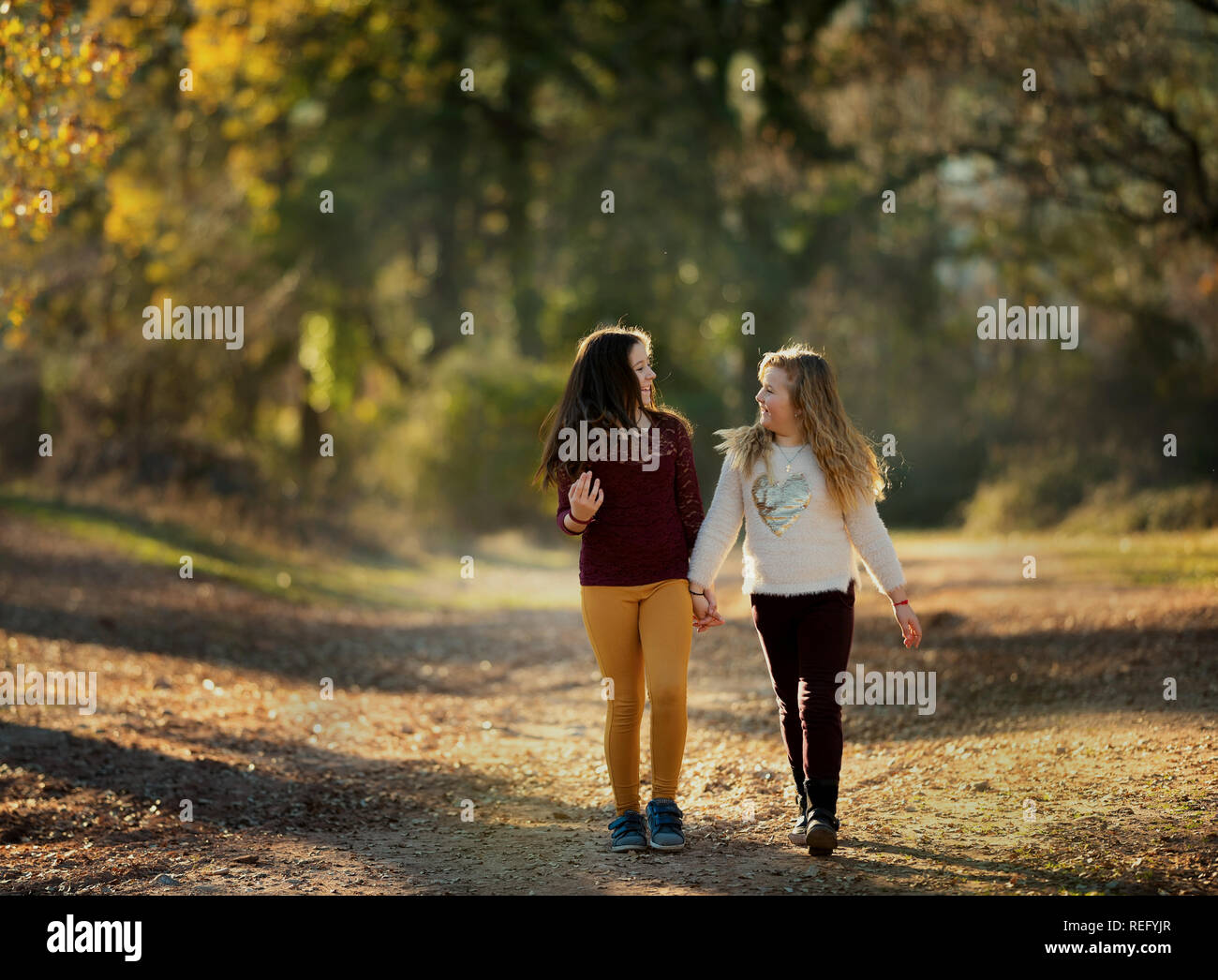 Happy kids huddle hi-res stock photography and images - Alamy