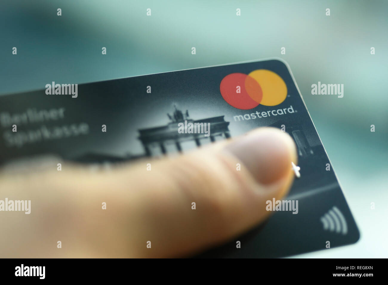 Mastercard credit card in hand hi-res stock photography and images - Alamy