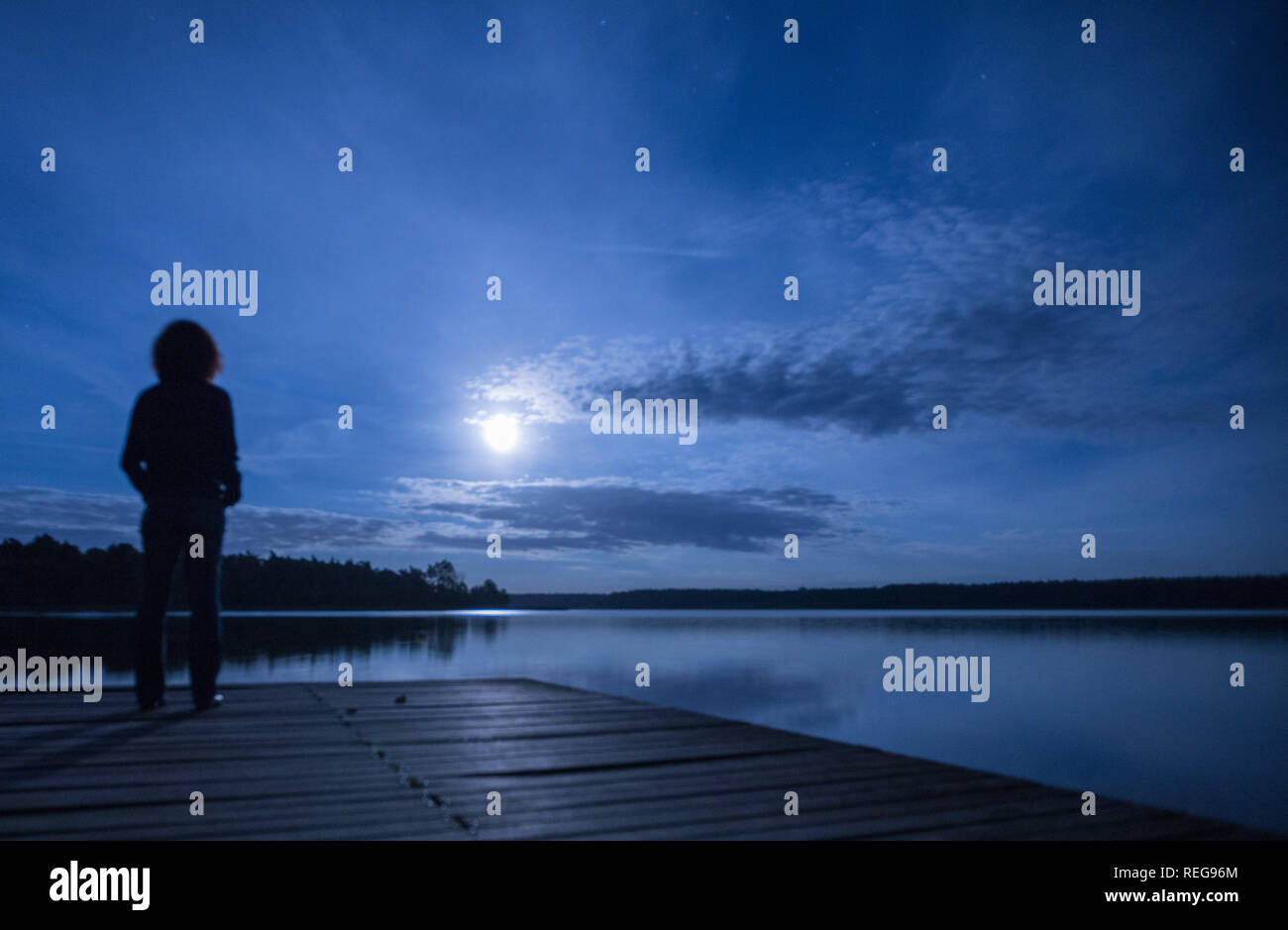 Neukloster, Germany. 07th Sep, 2017. A guest stands at full moon on a ...