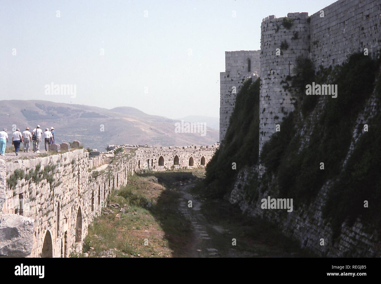 Scene of Western tourists walking the perimeter ramparts at the ...
