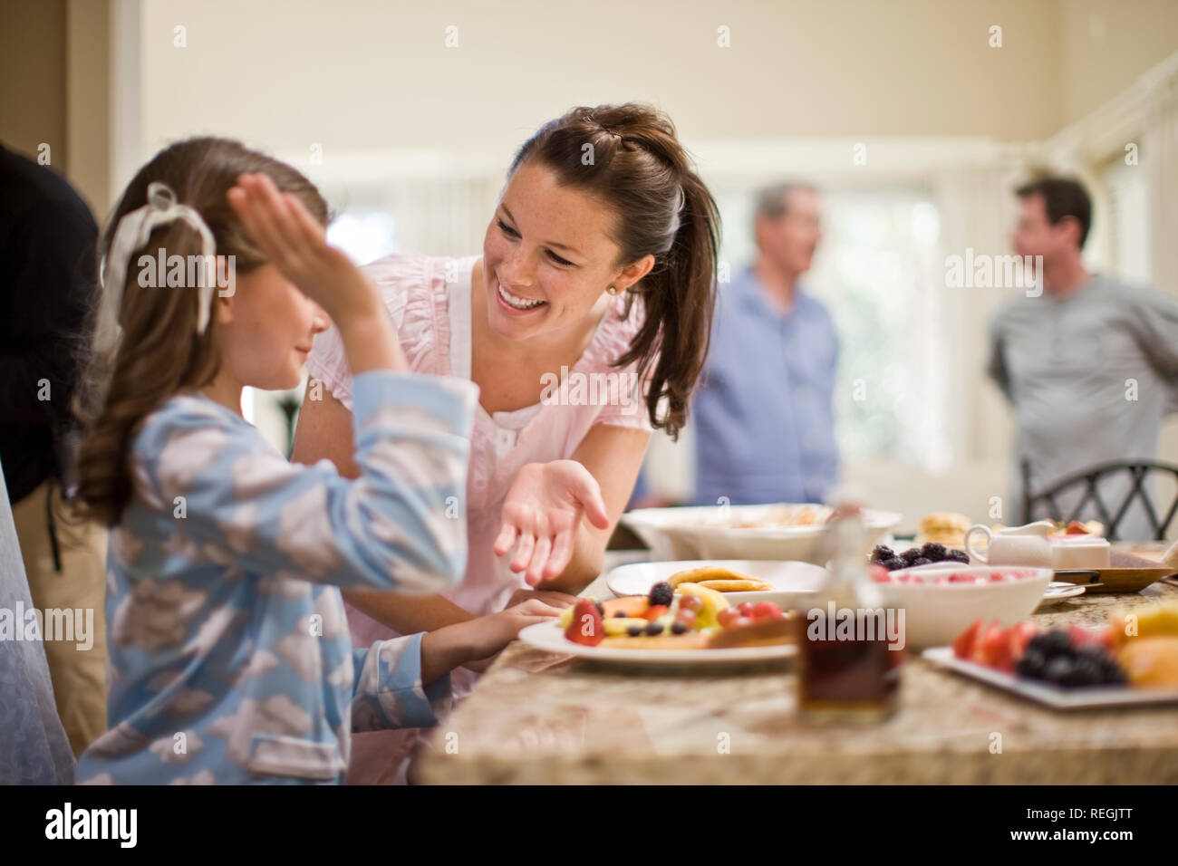 Children making something together hi-res stock photography and images ...