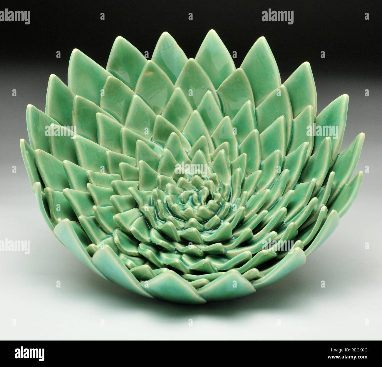 Petal formed jade ceramic glazed bowl Stock Photo - Alamy