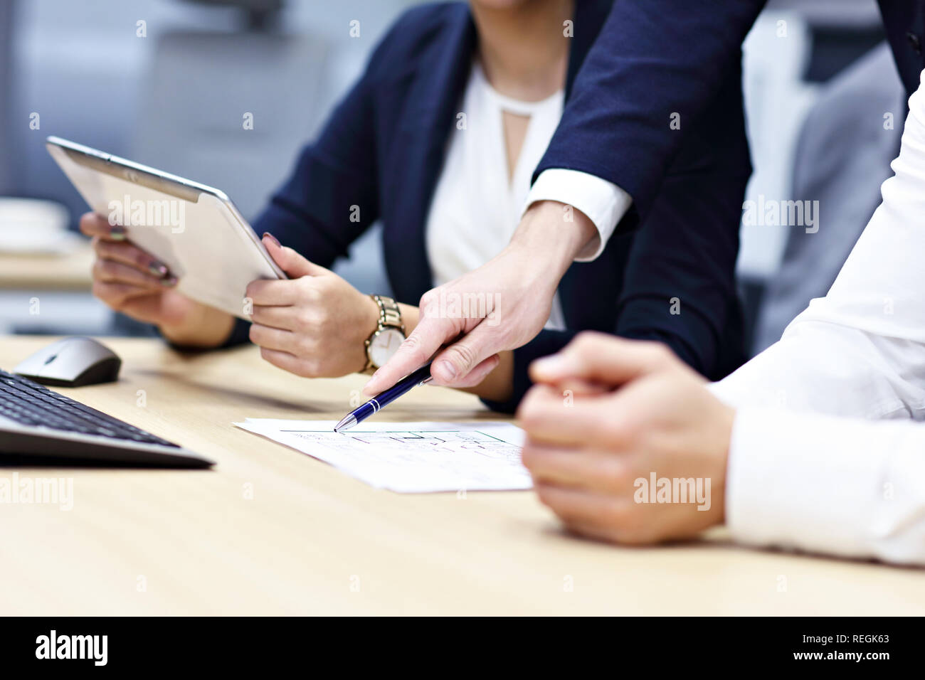 Business people exchanging documents hi-res stock photography and ...
