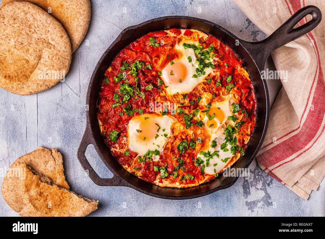 Traditional israeli shakshuka in frying hi-res stock photography and ...