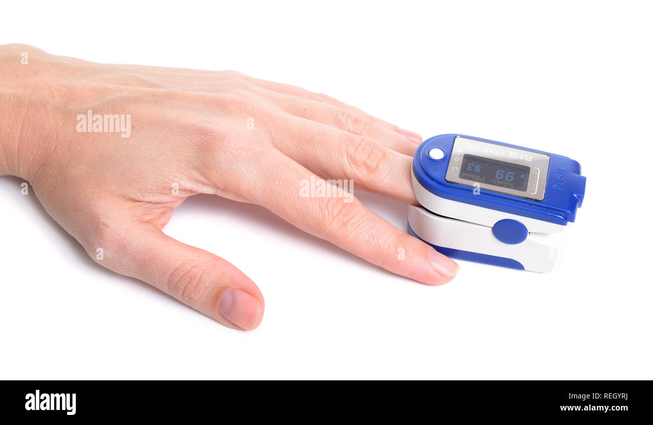 Pulse oximeter with hand of patient isolated on white background Stock ...