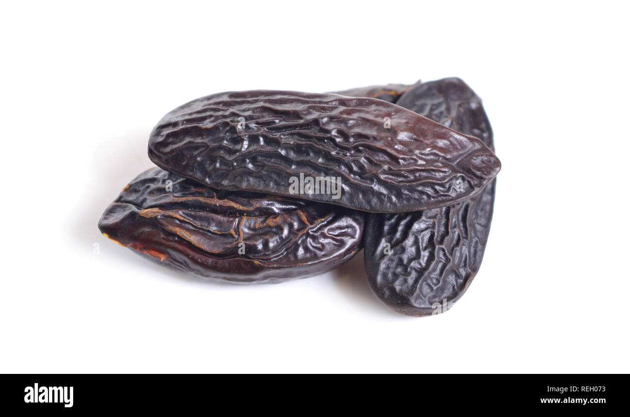 Dried tonka beans isolated on white background Stock Photo - Alamy
