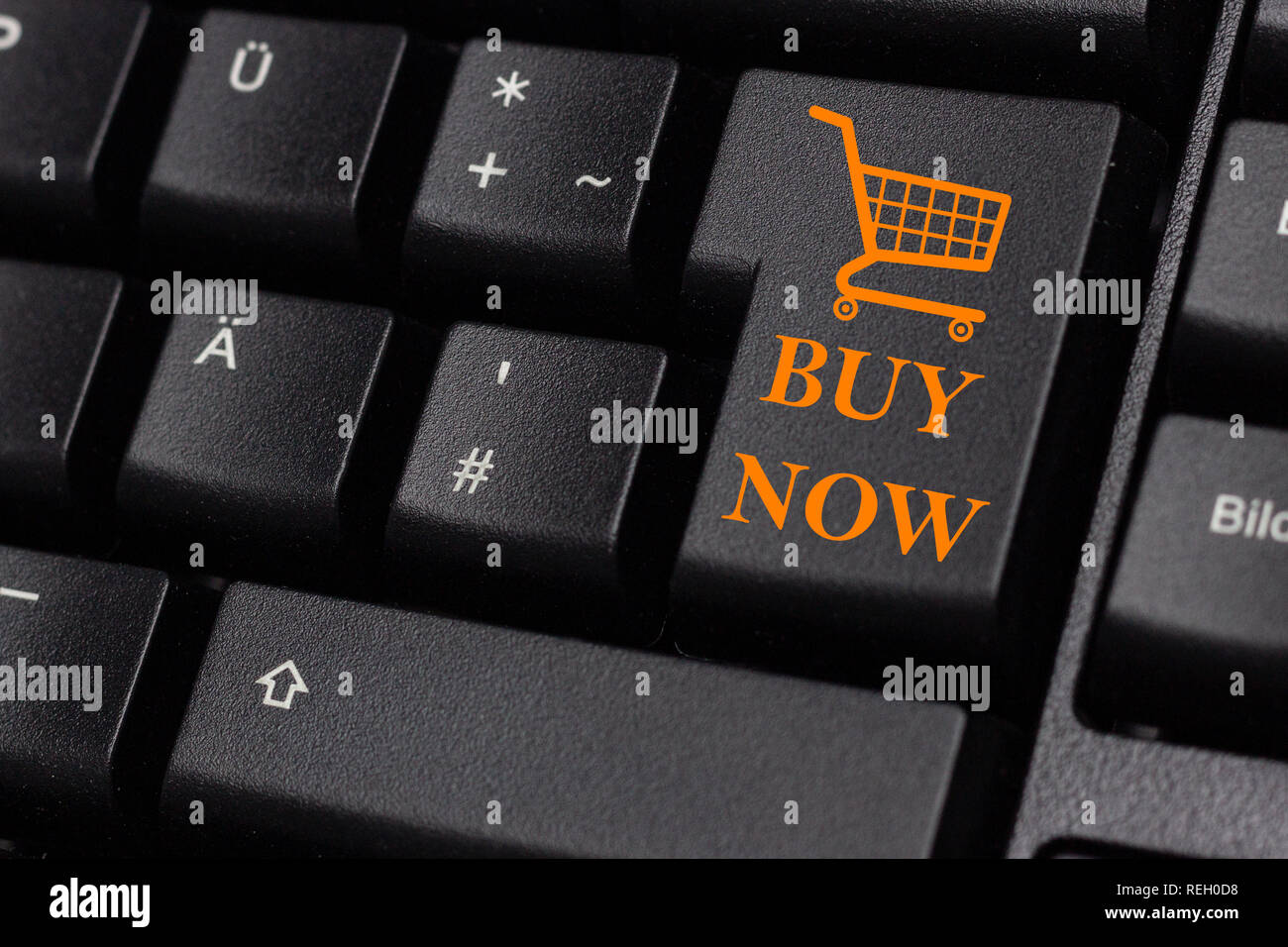 A key that says buy, concept online shopping Stock Photo - Alamy