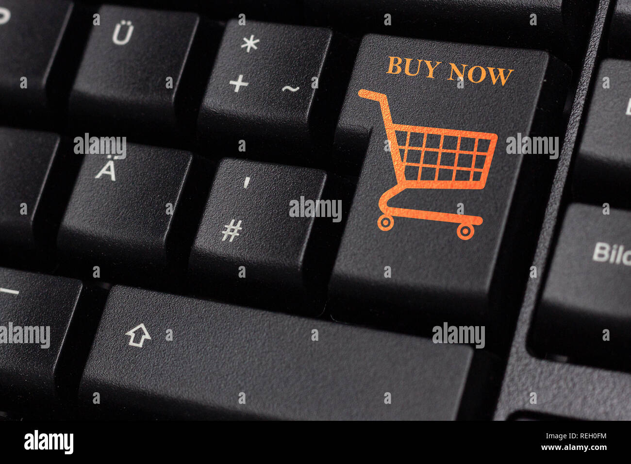 A key that says buy, concept online shopping Stock Photo - Alamy