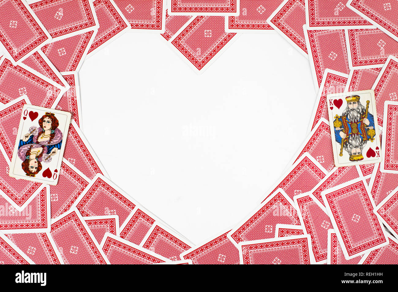 Heart shape made of red playing cards with King and Quinn Stock Photo ...