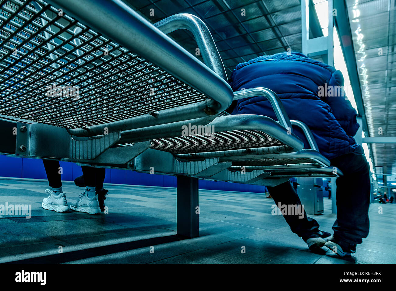 Man sitting from behind in jeans hi-res stock photography and images ...