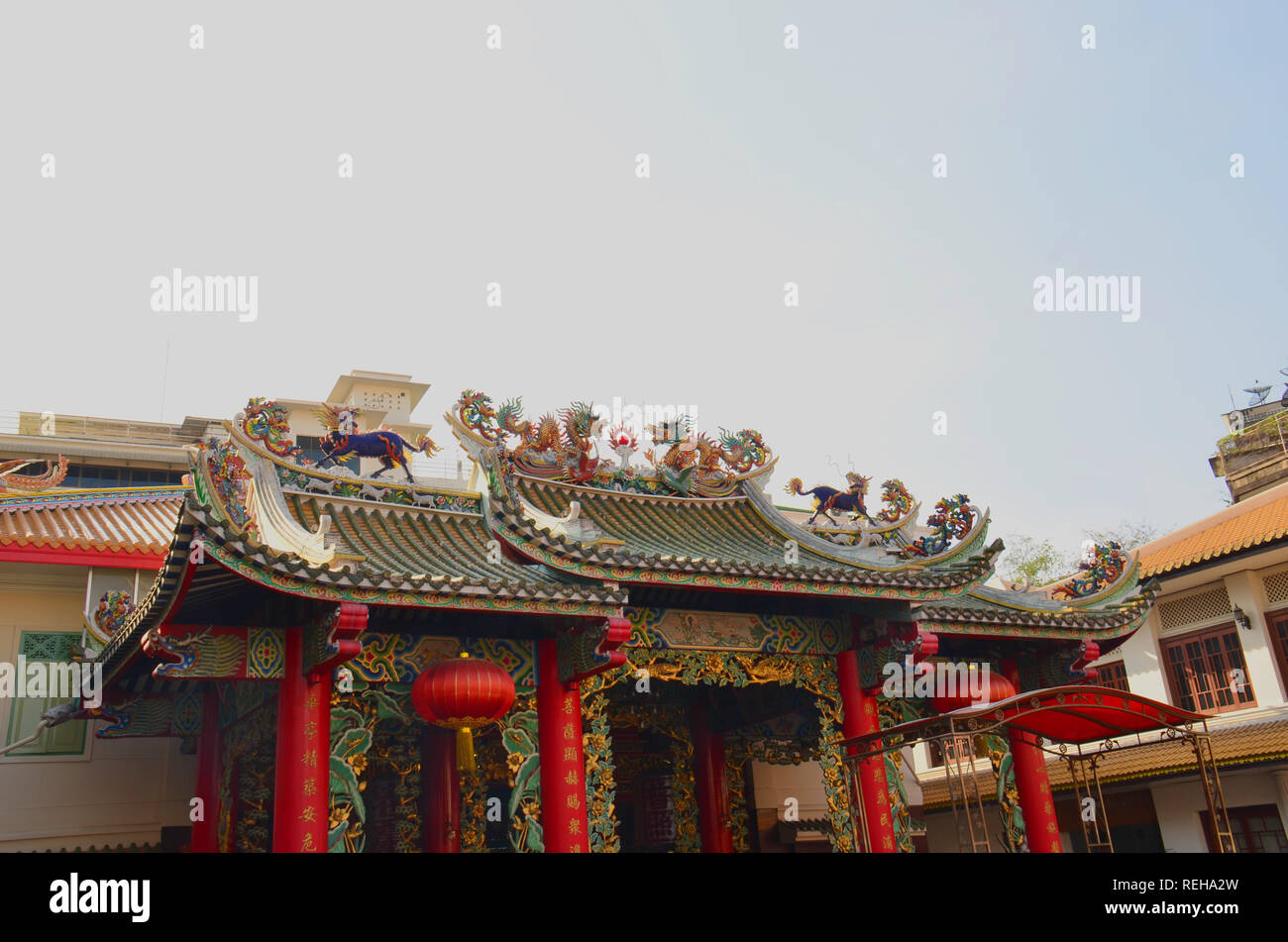 Colourful carvings of dragons on the roof of this building in the China ...