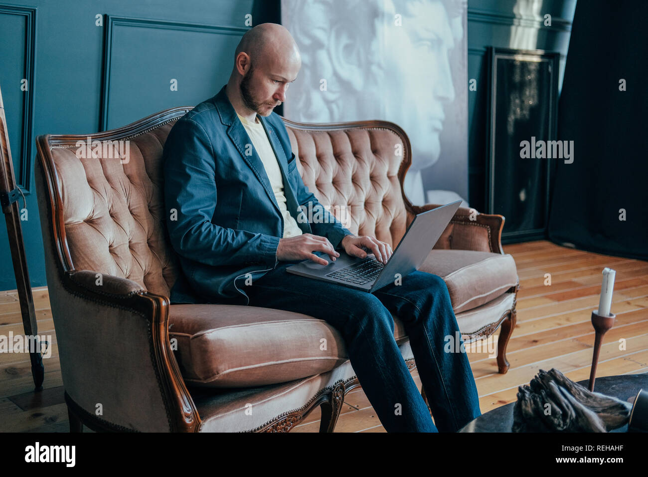Attractive adult successful surprised bald man with beard in suit ...