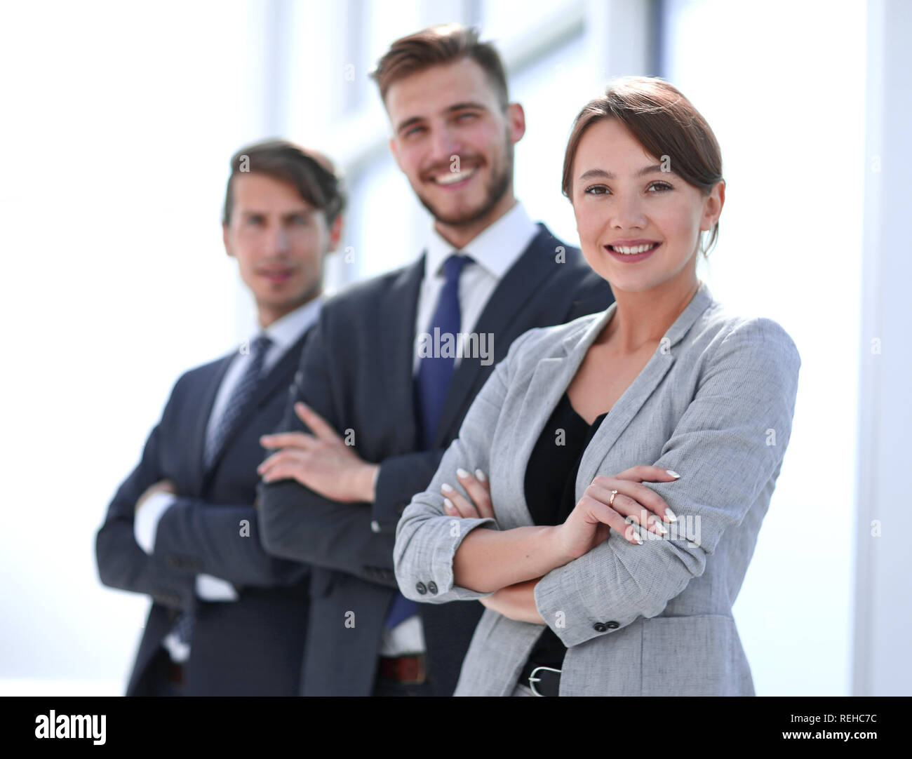 company employees standing together Stock Photo - Alamy