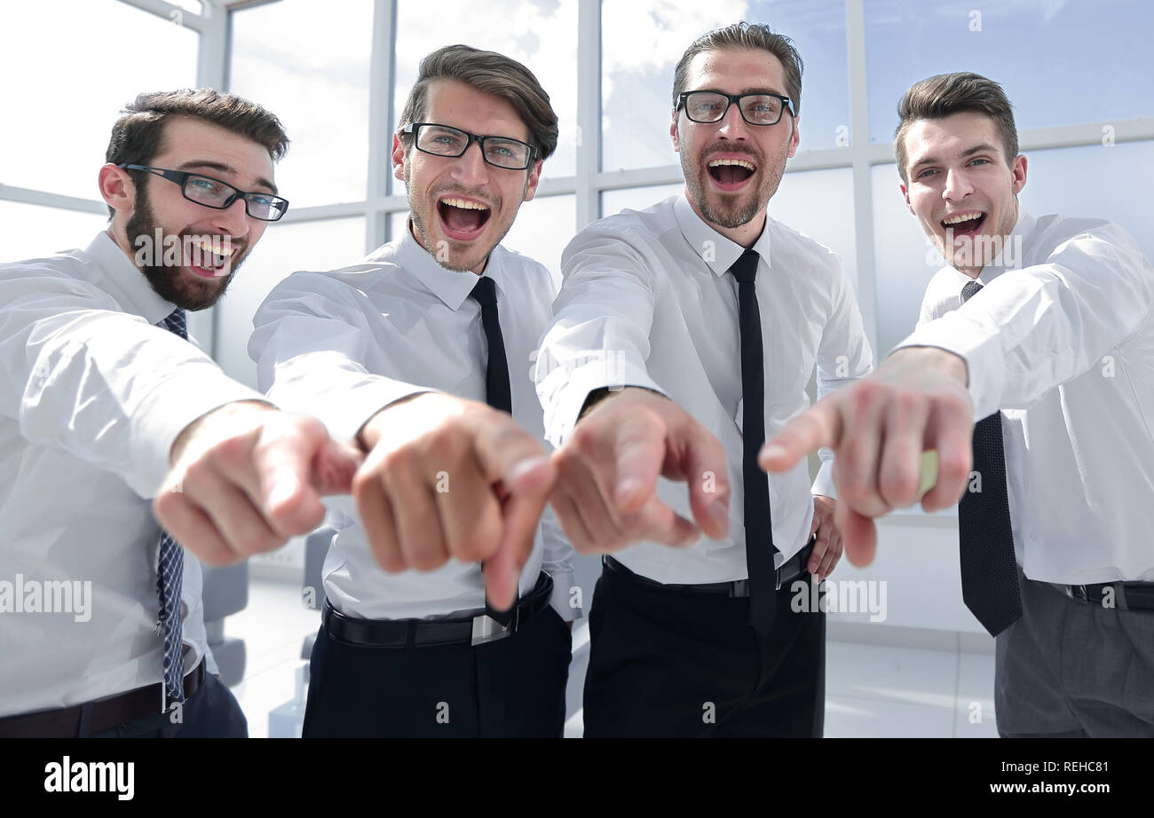 happy employees pointing at you Stock Photo - Alamy