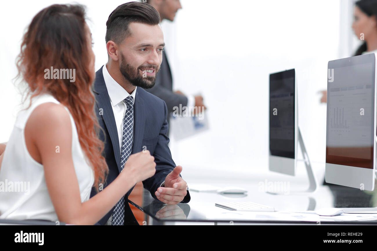 colleagues talking, sitting at your Desk Stock Photo - Alamy