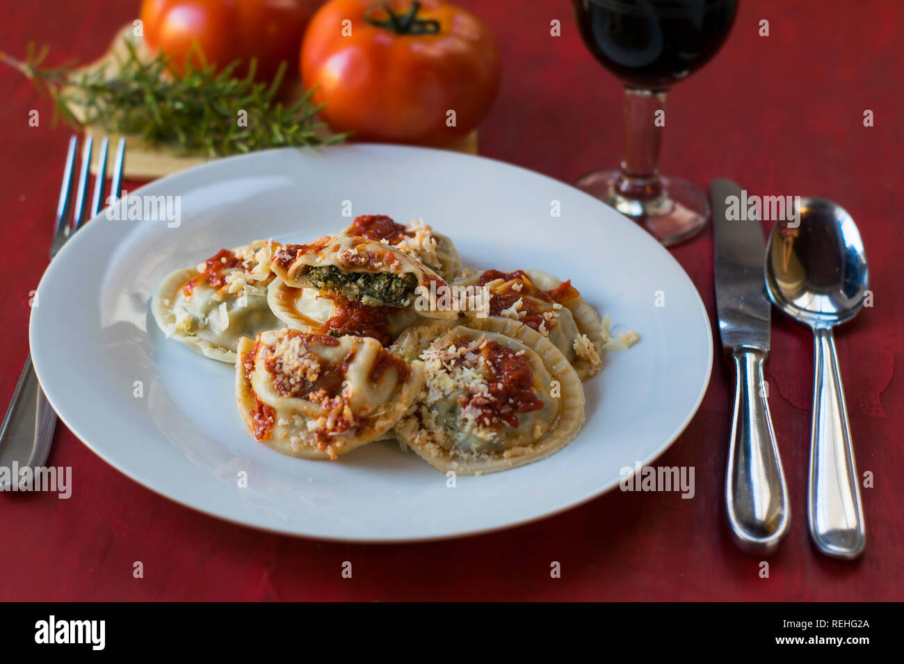 Making homemade pasta: Large round ravioli (Sorrentino) cooked, served ...